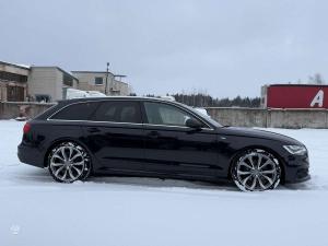 Black Audi A6 2012 in Utena, with an engine capacity of 2.97 L and mileage of 231 thousand km for 12999 €, photo 4 on AUTOMOTO.COM.LV