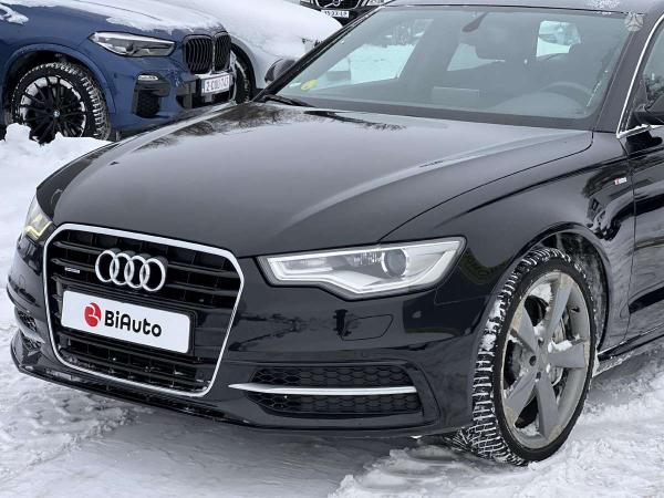Black Audi A6 2012 in Utena, with an engine capacity of 2.97 L and mileage of 297 thousand km for 11650 €, photo 2 on AUTOMOTO.COM.LV