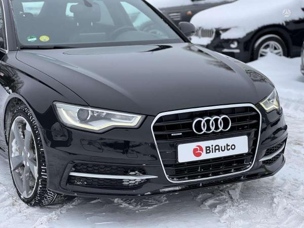 Black Audi A6 2012 in Utena, with an engine capacity of 2.97 L and mileage of 297 thousand km for 11650 €, photo 7 on AUTOMOTO.COM.LV