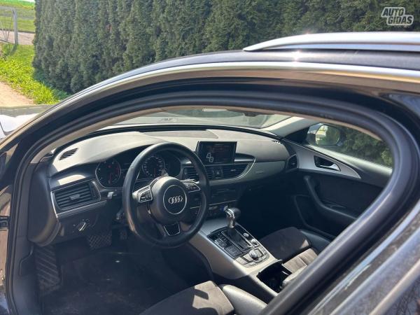 Black Audi A6 2012 in Klaipeda, with an engine capacity of 3.00 L and mileage of 340 thousand km for 9300 €, photo 7 on AUTOMOTO.COM.LV