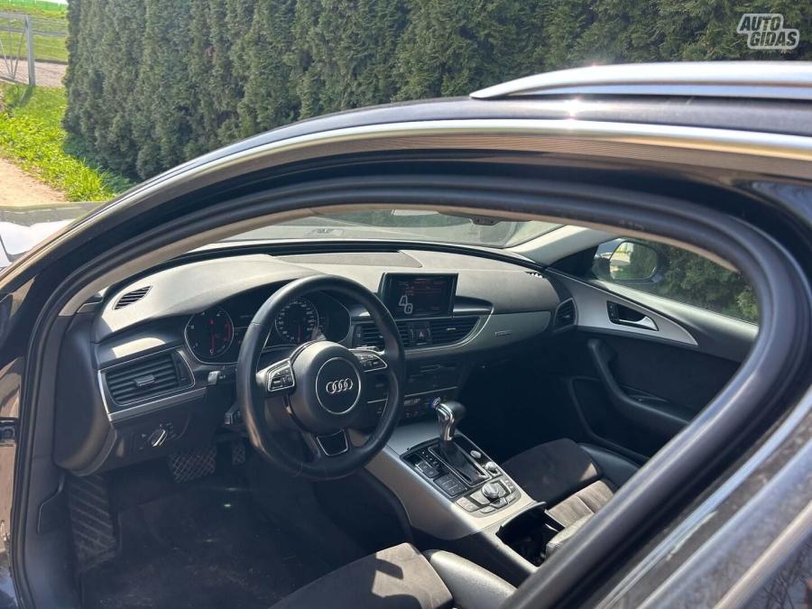 Black Audi A6 2012 in Klaipeda, with an engine capacity of 3.00 L and mileage of 340 thousand km for 9300 €, photo 8 on AUTOMOTO.COM.LV