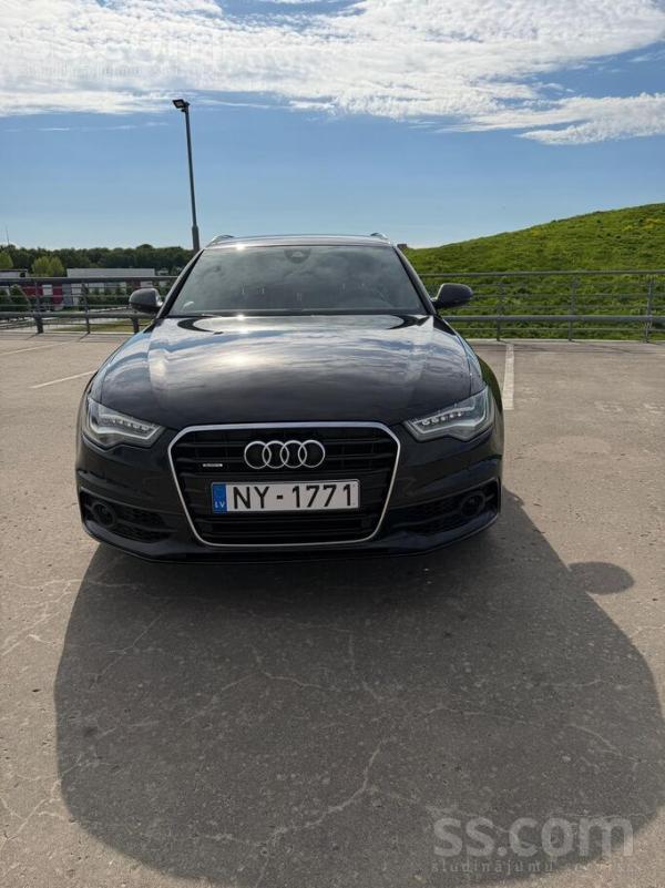 Black Audi A6 2012 in Riga, with an engine capacity of 3.00 L and mileage of 295 thousand km for 15900 €, photo 1 on AUTOMOTO.COM.LV