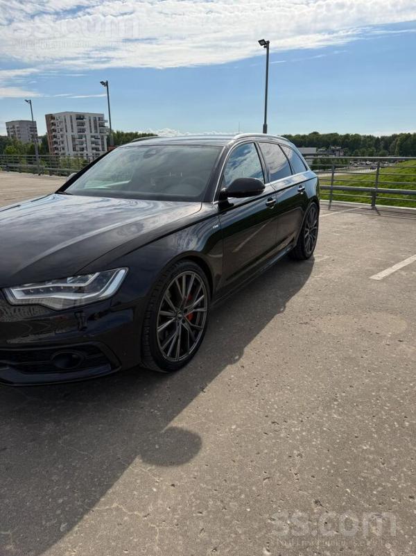 Black Audi A6 2012 in Riga, with an engine capacity of 3.00 L and mileage of 295 thousand km for 15900 €, photo 2 on AUTOMOTO.COM.LV