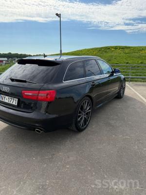 Black Audi A6 2012 in Riga, with an engine capacity of 3.00 L and mileage of 295 thousand km for 15900 €, photo 5 on AUTOMOTO.COM.LV