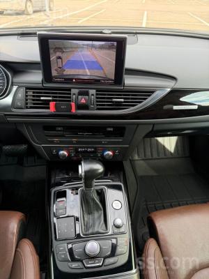 Black Audi A6 2012 in Riga, with an engine capacity of 3.00 L and mileage of 295 thousand km for 15900 €, photo 9 on AUTOMOTO.COM.LV