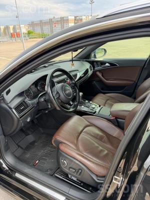 Black Audi A6 2012 in Riga, with an engine capacity of 3.00 L and mileage of 295 thousand km for 15900 €, photo 14 on AUTOMOTO.COM.LV
