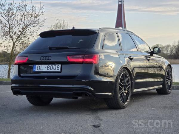 Black Audi A6 2012 in Riga, with an engine capacity of 3.00 L and mileage of 219 thousand km for 12950 €, photo 4 on AUTOMOTO.COM.LV