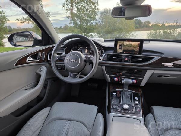 Black Audi A6 2012 in Riga, with an engine capacity of 3.00 L and mileage of 219 thousand km for 12950 €, photo 6 on AUTOMOTO.COM.LV