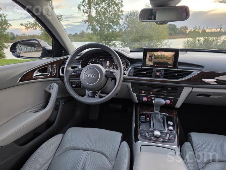 Black Audi A6 2012 in Riga, with an engine capacity of 3.00 L and mileage of 219 thousand km for 12950 €, photo 7 on AUTOMOTO.COM.LV