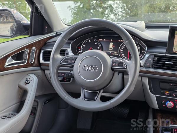 Black Audi A6 2012 in Riga, with an engine capacity of 3.00 L and mileage of 219 thousand km for 12950 €, photo 7 on AUTOMOTO.COM.LV