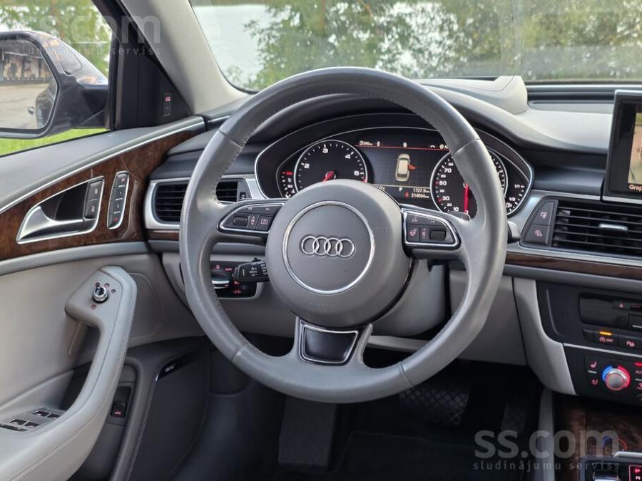 Black Audi A6 2012 in Riga, with an engine capacity of 3.00 L and mileage of 219 thousand km for 12950 €, photo 8 on AUTOMOTO.COM.LV