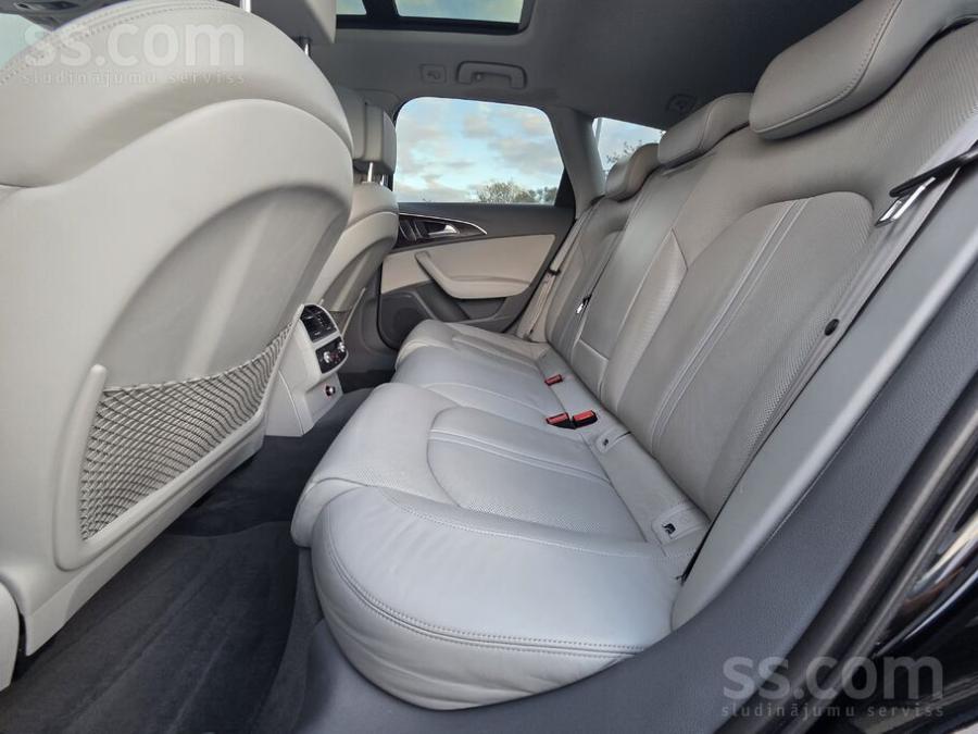 Black Audi A6 2012 in Riga, with an engine capacity of 3.00 L and mileage of 219 thousand km for 12950 €, photo 11 on AUTOMOTO.COM.LV