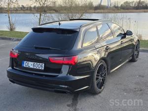 Black Audi A6 2012 in Riga, with an engine capacity of 3.00 L and mileage of 219 thousand km for 12950 €, photo 20 on AUTOMOTO.COM.LV