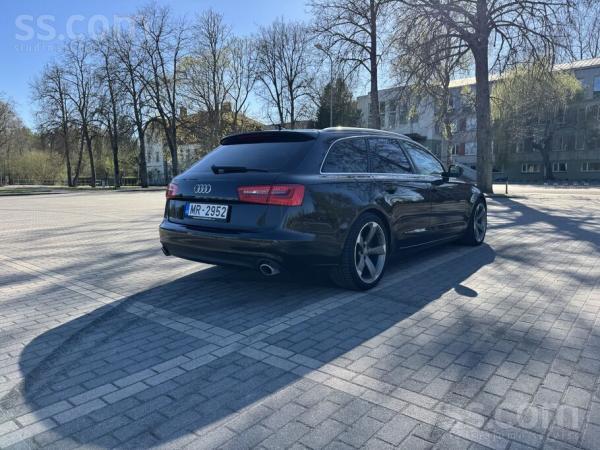 Black Audi A6 2012 in Jelgava, with an engine capacity of 3.00 L and mileage of 289 thousand km for 10990 €, photo 4 on AUTOMOTO.COM.LV