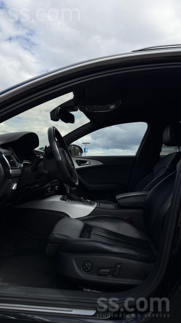 Black Audi A6 2012 in Riga, with an engine capacity of 3.00 L and mileage of 251 thousand km for 12000 €, photo 7 on AUTOMOTO.COM.LV