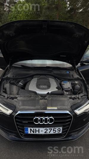 Black Audi A6 2012 in Riga, with an engine capacity of 3.00 L and mileage of 251 thousand km for 12000 €, photo 18 on AUTOMOTO.COM.LV