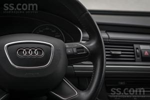 Black Audi A6 2012 in Riga, with an engine capacity of 3.00 L and mileage of 233 thousand km for 12500 €, photo 18 on AUTOMOTO.COM.LV