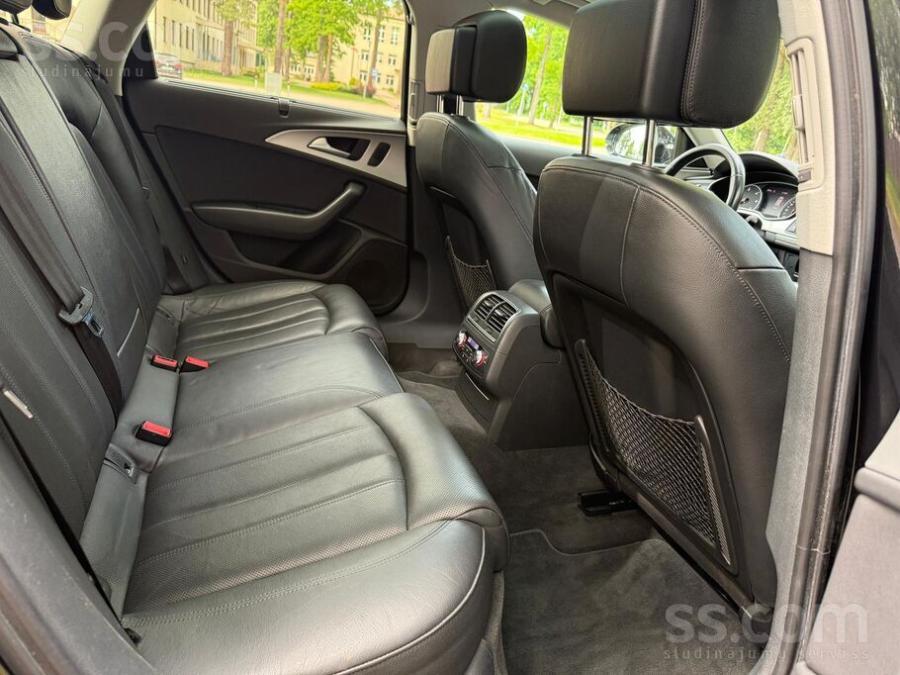 Black Audi A6 2012 in Riga, with an engine capacity of 3.00 L and mileage of 314 thousand km for 10600 €, photo 9 on AUTOMOTO.COM.LV