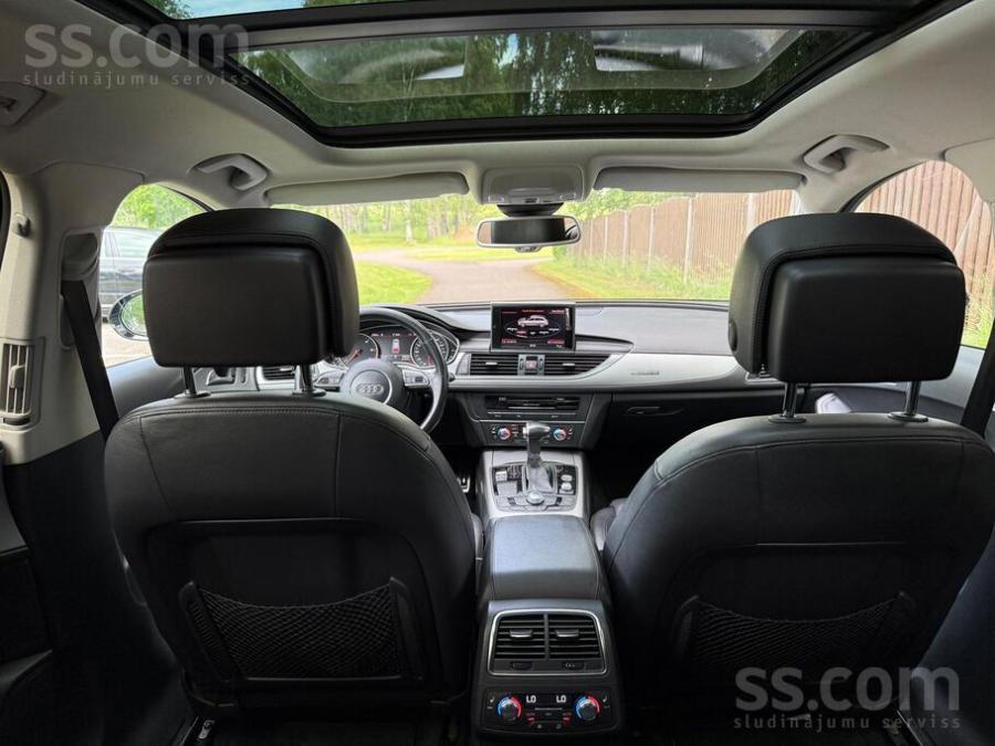Black Audi A6 2012 in Riga, with an engine capacity of 3.00 L and mileage of 314 thousand km for 10600 €, photo 11 on AUTOMOTO.COM.LV