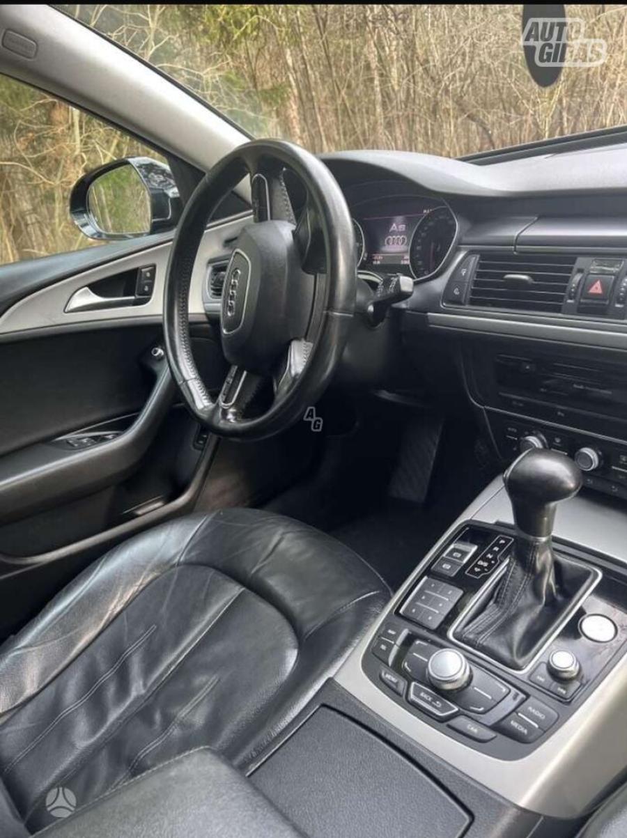 Black Audi A6 2012 in Raseiniai, with an engine capacity of 3.00 L and mileage of 318 thousand km for 8800 €, photo 21 on AUTOMOTO.COM.LV