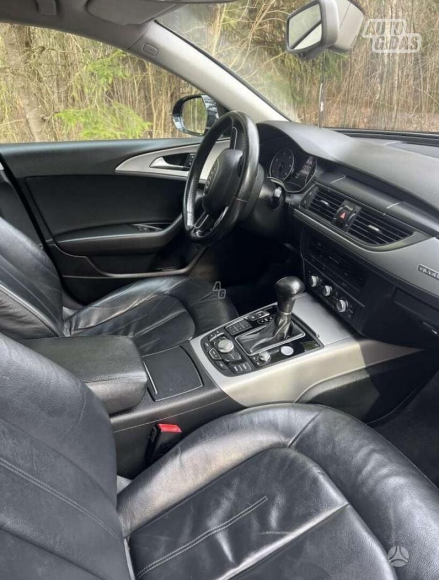 Black Audi A6 2012 in Raseiniai, with an engine capacity of 3.00 L and mileage of 318 thousand km for 8800 €, photo 22 on AUTOMOTO.COM.LV