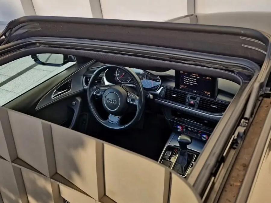 Black Audi A6 2012 in Riga, with an engine capacity of 3.00 L and mileage of 136 thousand km for 18900 €, photo 16 on AUTOMOTO.COM.LV