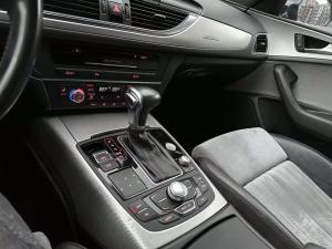 Black Audi A6 2012 in Riga, with an engine capacity of 3.00 L and mileage of 276 thousand km for 9990 €, photo 22 on AUTOMOTO.COM.LV