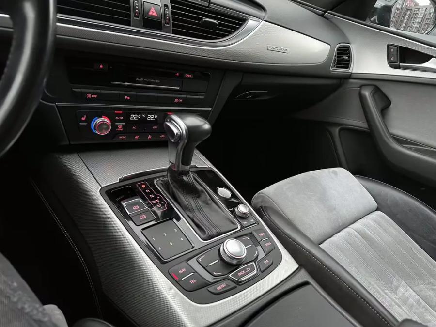 Black Audi A6 2012 in Riga, with an engine capacity of 3.00 L and mileage of 276 thousand km for 9990 €, photo 22 on AUTOMOTO.COM.LV