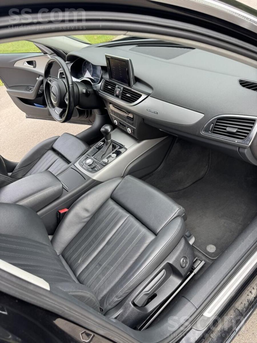Black Audi A6 2012 in Valmiera, with an engine capacity of 3.00 L and mileage of 276 thousand km for 7950 €, photo 14 on AUTOMOTO.COM.LV