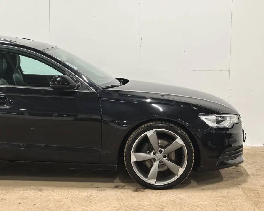 Black Audi A6 2012 in Jurmala, with an engine capacity of 3.00 L and mileage of 331 thousand km for 11995 €, photo 16 on AUTOMOTO.COM.LV