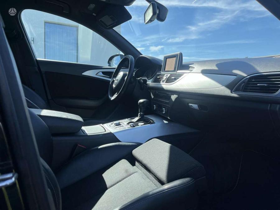 Black Audi A6 2012 in Alytus, with an engine capacity of 2.97 L and mileage of 218 thousand km for 8999 €, photo 22 on AUTOMOTO.COM.LV