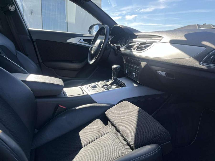 Black Audi A6 2012 in Alytus, with an engine capacity of 2.97 L and mileage of 218 thousand km for 8999 €, photo 23 on AUTOMOTO.COM.LV