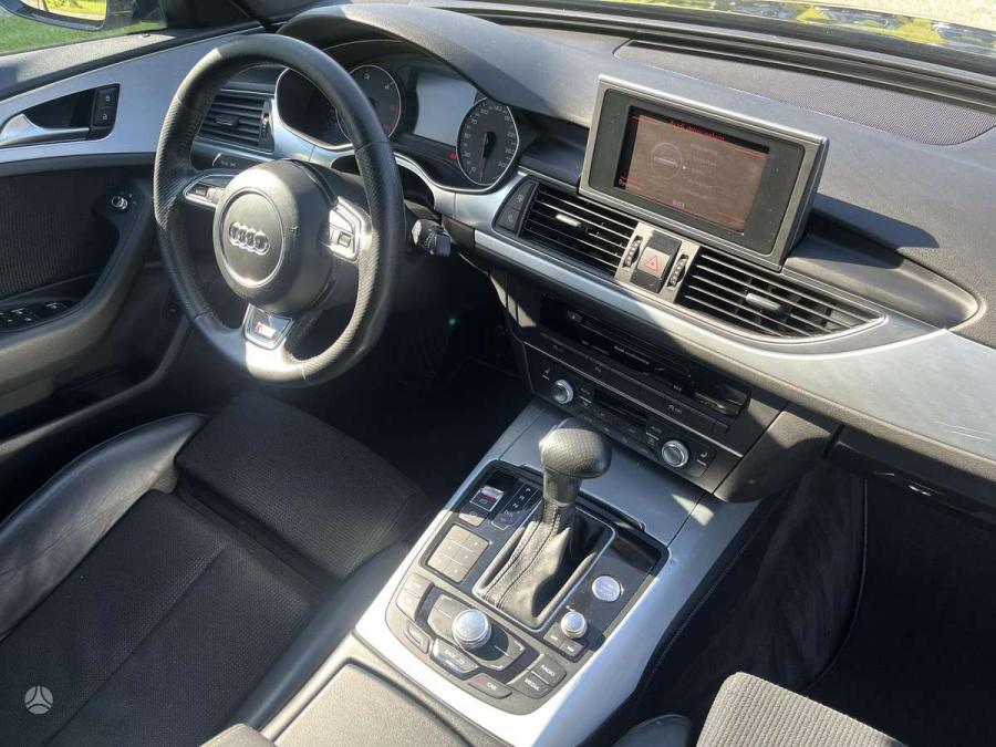 Black Audi A6 2012 in Alytus, with an engine capacity of 2.97 L and mileage of 218 thousand km for 8999 €, photo 24 on AUTOMOTO.COM.LV
