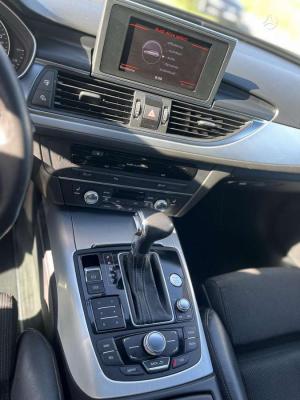 Black Audi A6 2012 in Alytus, with an engine capacity of 2.97 L and mileage of 218 thousand km for 8999 €, photo 36 on AUTOMOTO.COM.LV