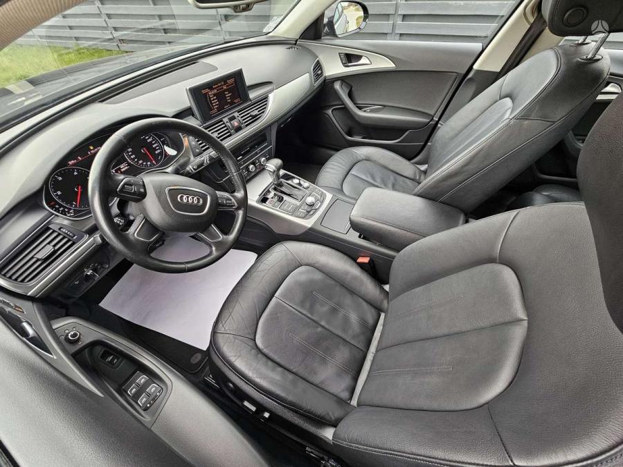 Black Audi A6 2012 in Klaipeda, with an engine capacity of 1.97 L and mileage of 290 thousand km for 8750 €, photo 12 on AUTOMOTO.COM.LV