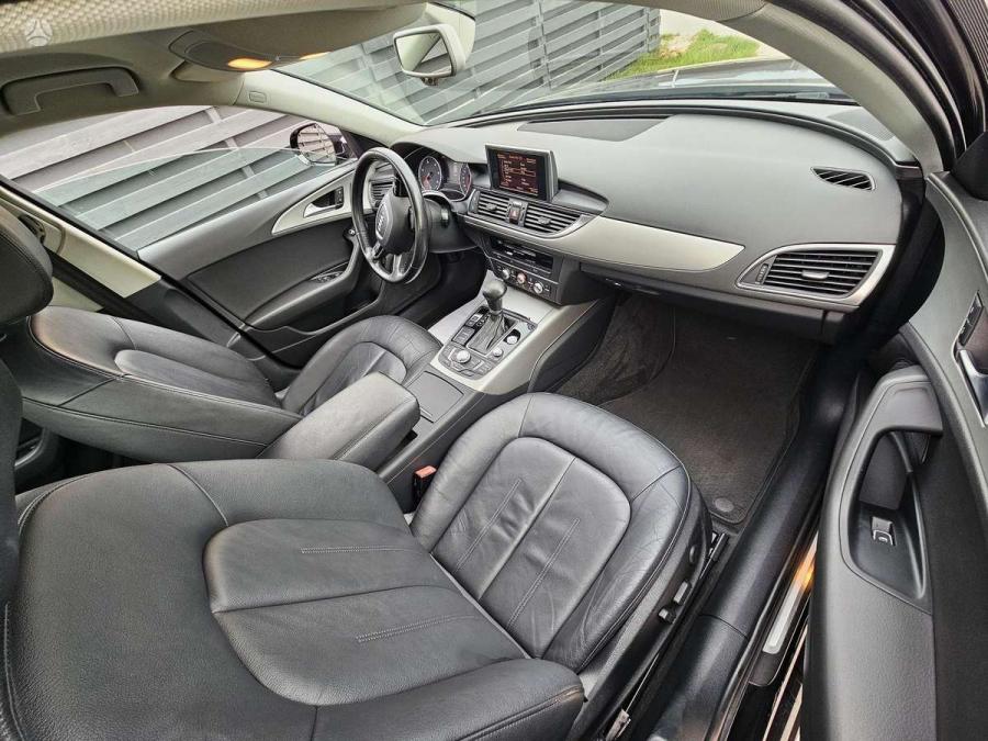 Black Audi A6 2012 in Klaipeda, with an engine capacity of 1.97 L and mileage of 290 thousand km for 8750 €, photo 14 on AUTOMOTO.COM.LV