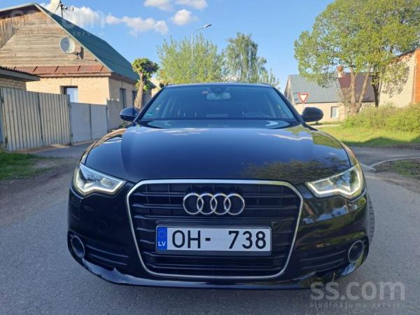Black Audi A6 2012 in Daugavpils, with an engine capacity of 3.00 L and mileage of 215 thousand km for 9350 €, photo 7 on AUTOMOTO.COM.LV