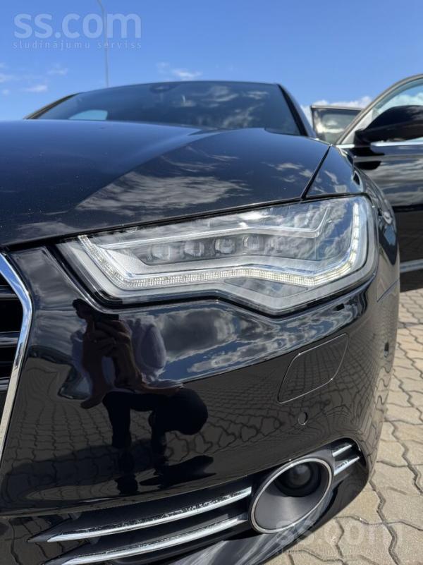 Black Audi A6 2012 in Riga, with an engine capacity of 3.00 L and mileage of 303 thousand km for 10800 €, photo 2 on AUTOMOTO.COM.LV