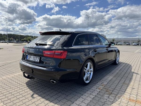 Black Audi A6 2012 in Riga, with an engine capacity of 3.00 L and mileage of 303 thousand km for 10800 €, photo 4 on AUTOMOTO.COM.LV