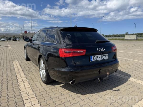 Black Audi A6 2012 in Riga, with an engine capacity of 3.00 L and mileage of 303 thousand km for 10800 €, photo 5 on AUTOMOTO.COM.LV
