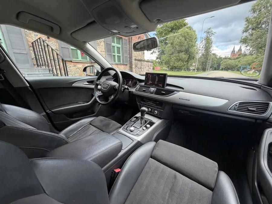 Black Audi A6 2012 in Rezekne, with an engine capacity of 3.00 L and mileage of 238 thousand km for 11990 €, photo 8 on AUTOMOTO.COM.LV