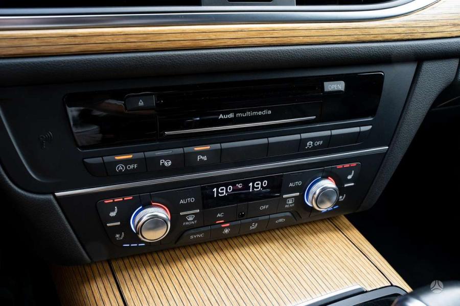 Black Audi A6 2012 in Vilnius, with an engine capacity of 2.97 L and mileage of 249 thousand km for 14800 €, photo 38 on AUTOMOTO.COM.LV