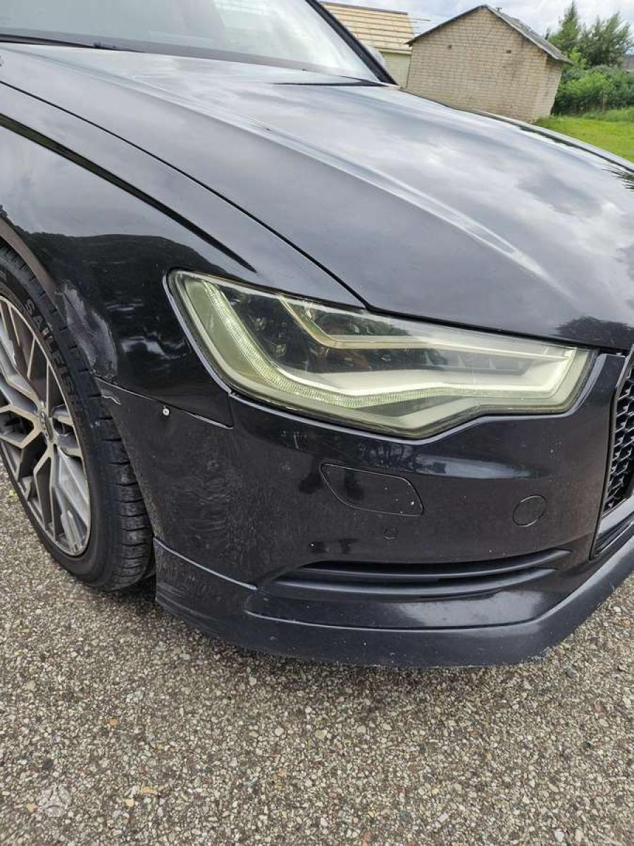 Black Audi A6 2012 in Lazdijai, with an engine capacity of 2.97 L and mileage of 400 thousand km for 9500 €, photo 12 on AUTOMOTO.COM.LV