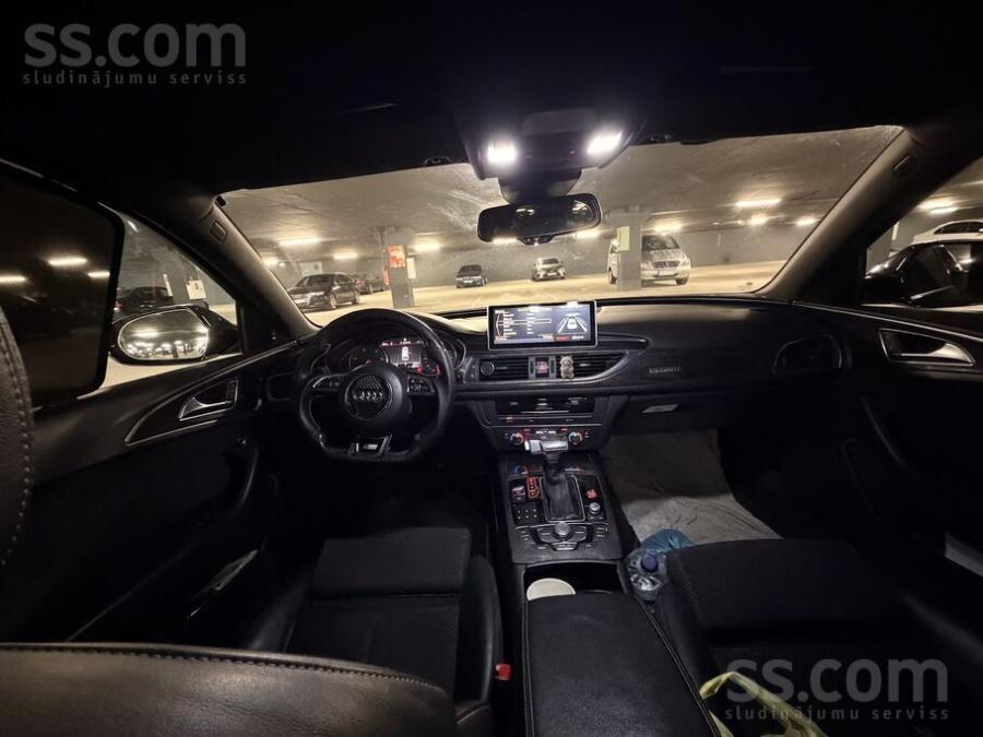 Black Audi A6 2012 in Riga, with an engine capacity of 3.00 L and mileage of 270 thousand km for 14900 €, photo 7 on AUTOMOTO.COM.LV