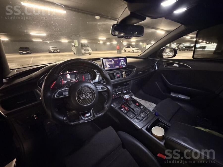 Black Audi A6 2012 in Riga, with an engine capacity of 3.00 L and mileage of 270 thousand km for 14900 €, photo 12 on AUTOMOTO.COM.LV