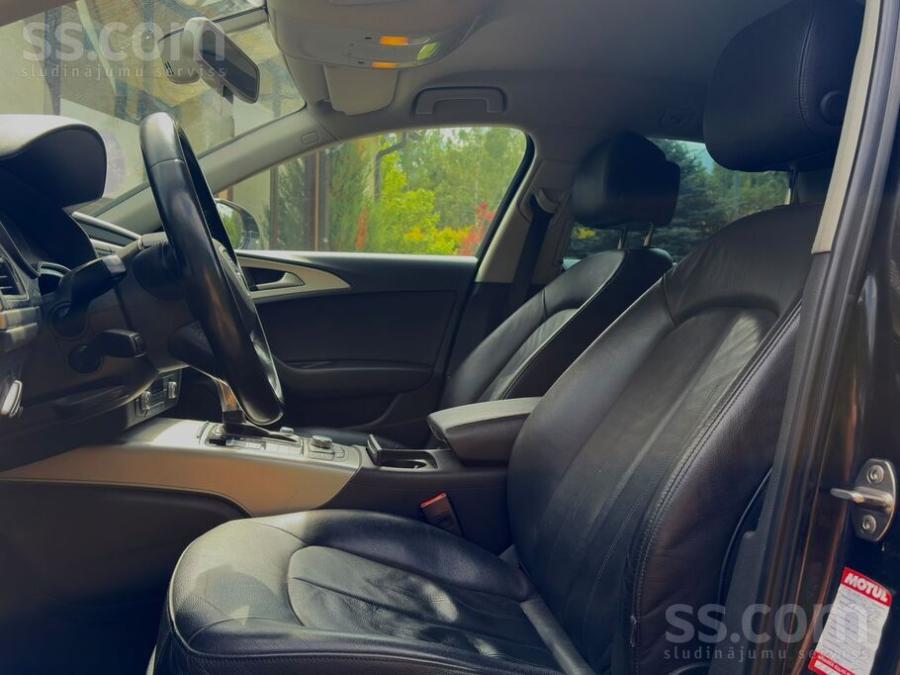 Black Audi A6 2012 in Riga, with an engine capacity of 2.00 L and mileage of 233 thousand km for 9600 €, photo 7 on AUTOMOTO.COM.LV