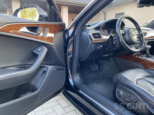 Black Audi A6 2012 in Bauska, with an engine capacity of 3.00 L and mileage of 295 thousand km for 12700 €, photo 6 on AUTOMOTO.COM.LV