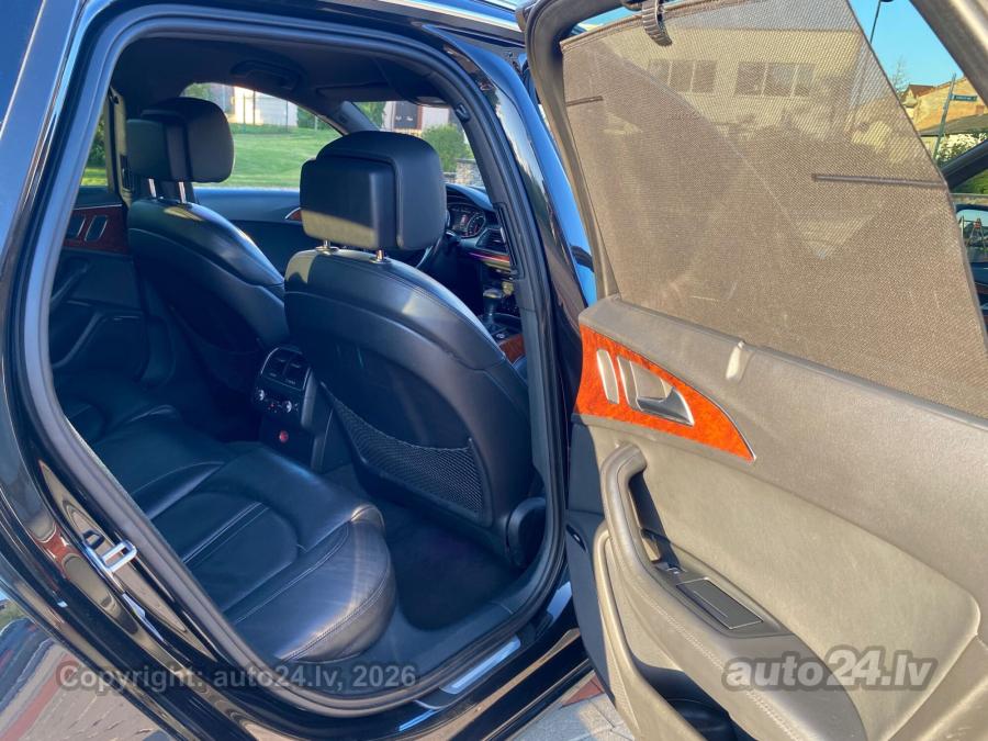 Black Audi A6 2012 in Riga, with an engine capacity of 3.00 L and mileage of 295 thousand km for 13500 €, photo 13 on AUTOMOTO.COM.LV