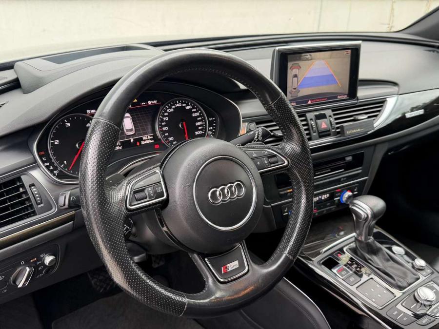 Black Audi A6 2012 in Utena, with an engine capacity of 2.97 L and mileage of 255 thousand km for 12950 €, photo 14 on AUTOMOTO.COM.LV
