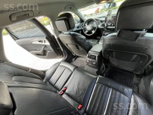 Black Audi A6 2012 in Riga, with an engine capacity of 3.00 L and mileage of 311 thousand km for 9200 €, photo 9 on AUTOMOTO.COM.LV
